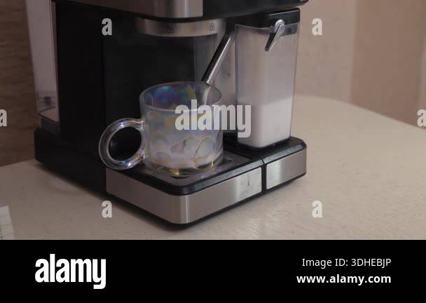 Steaming milk in cozy kitchen, Artisan espresso preparing smooth milk ...