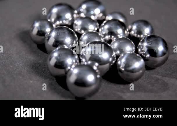 Steel balls on a black background, stainless steel Stock Video Footage ...