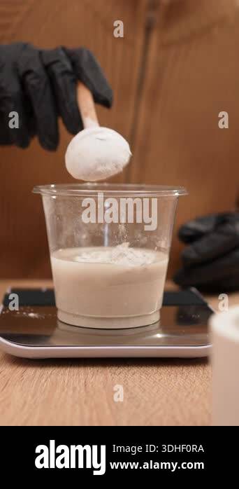 The process of making a plaster candlestick. Pouring white plaster ...