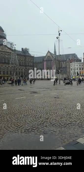 AMSTERDAM, NETHERLANDS - JANUARY 9, 2026: Daytime 4K footage of heavy ...