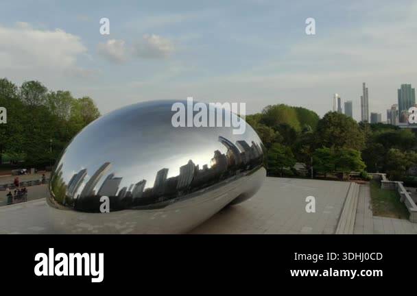 An aerial view of Cloud Gate (The Bean) shows its reflective, seamless ...
