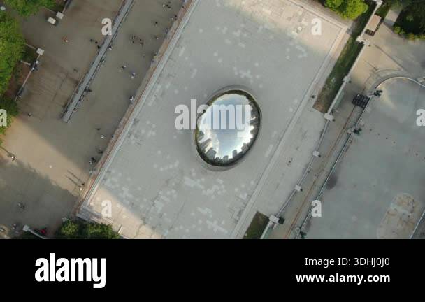 An aerial view of Cloud Gate (The Bean) shows its reflective, seamless ...
