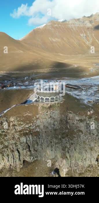 Early winter landscape near Friendship Arch in Caucasus. 4K vertical ...