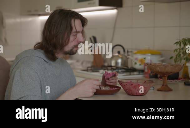 Man Eats Salad and Buckwheat Porridge For Breakfast 4K 10-bit Stock ...