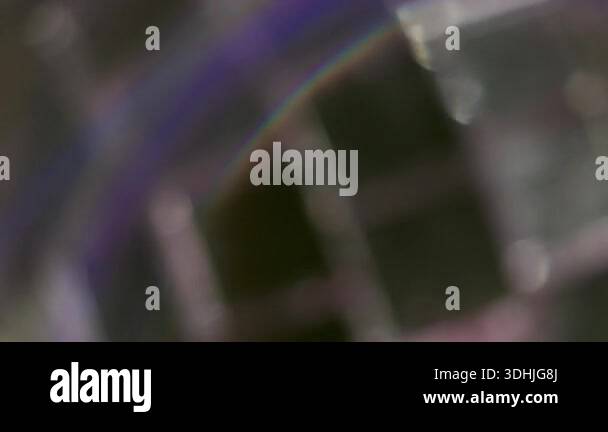 Defocused reflection leak. Light swirling. Colorful arch ring flash in ...