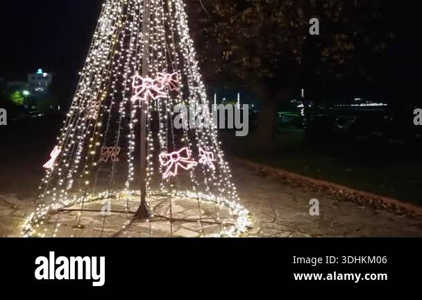 Decorative tree adorned with glowing lights Stock Video Footage - Alamy