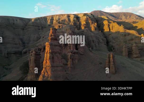 Stone pillars. Aerial view of rock formations. Sunset Stock Video ...