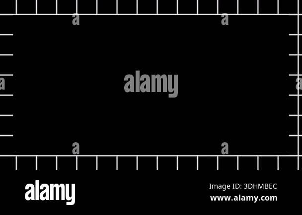 A dark rectangular frame features white measurement ticks along all ...