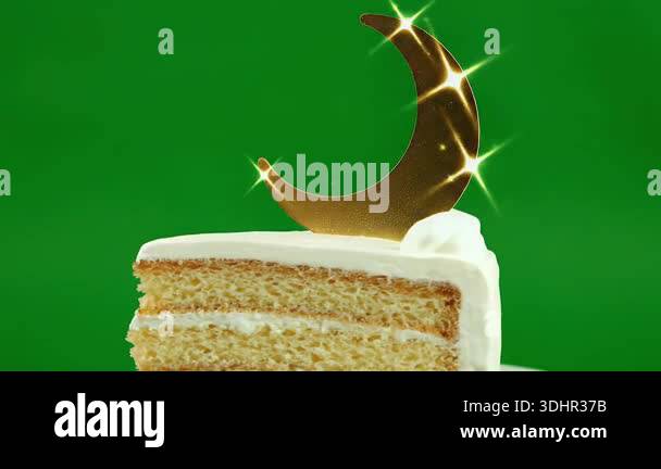 A delectable slice of vanilla cake with creamy white frosting and a ...