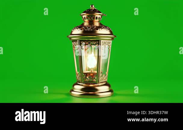 A beautiful golden Ramadan lantern with a warm flickering light rotates ...