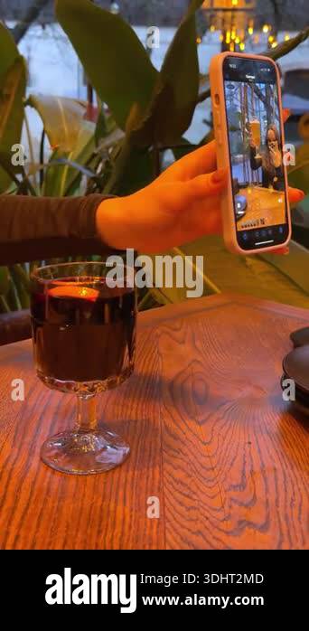 Hot mulled wine drink with orange slice and cinnamon stick festive ...