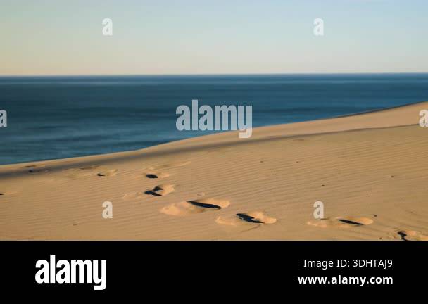 Minimal sand dunes slope gently toward Coast, forming clean diagonal ...
