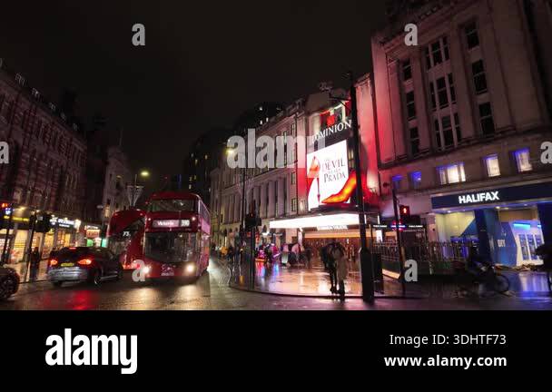 LONDON, UK - JANUARY 8, 2026 - Red double decker buses on a busy London ...