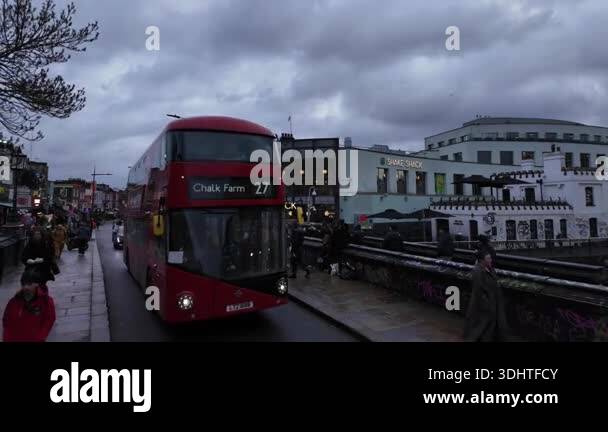 LONDON, UK - JANUARY 8, 2026 - Red double decker bus carrying ...