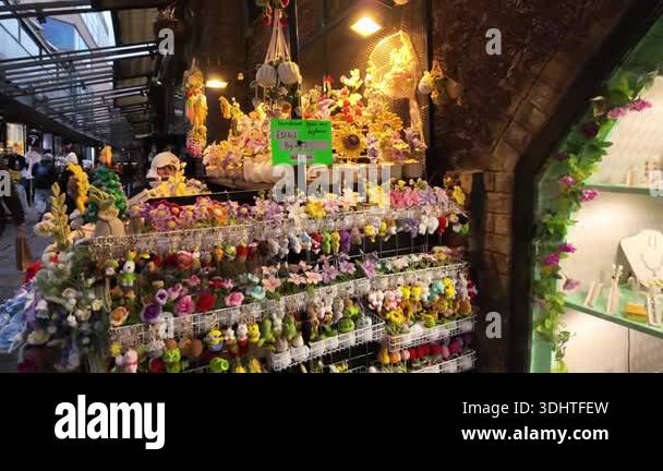 LONDON, UK - JANUARY 8, 2026 - A vibrant street market stall displaying ...