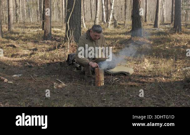 Bushcraft Man Making Fire Using Natural Materials in Forest, Outdoor ...