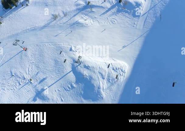 Vertical top down drone view of Jahorina ski slopes with skiers ...