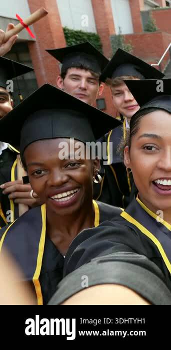 Happy multi ethnic group of university students in graduation gowns and ...