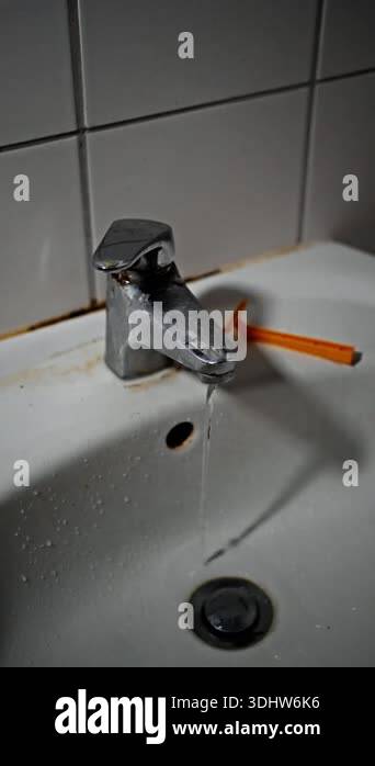 Faucet Leak Observed, Close Look At Bathroom Fixture, Signs Of ...