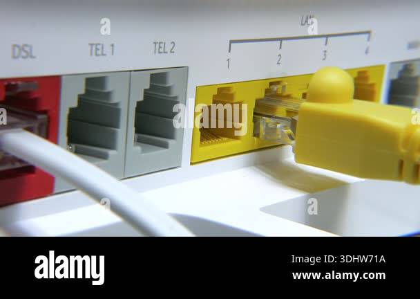 A close view of a network router showing DSL port, telephone line ...