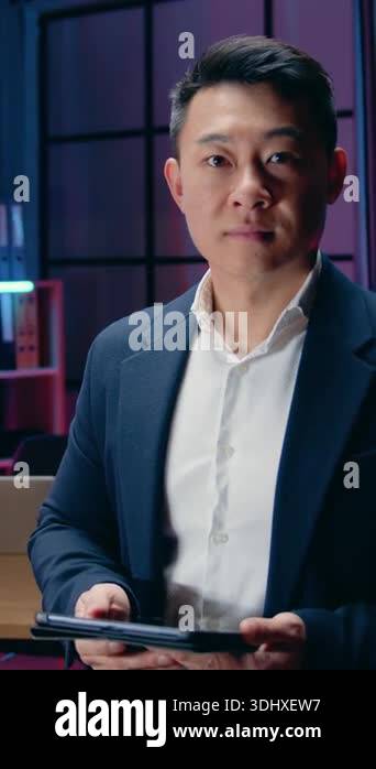 Attractive smiling successful professional 40-aged asian male office ...