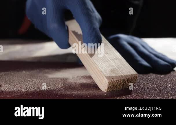 Extreme close-up of sandpaper for wood processing of materials in ...