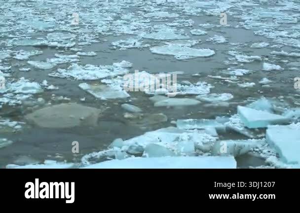 Climate change concept with melting and broken ice. Extreme winter cold ...