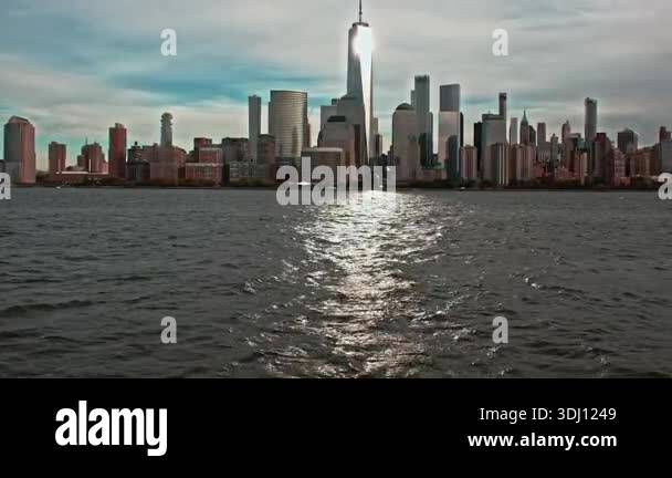 New York skyline shines in daylight. New York cityscape reflects on ...