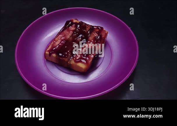 Footage of a slice of traditional Indonesian mandarin layer cake ...