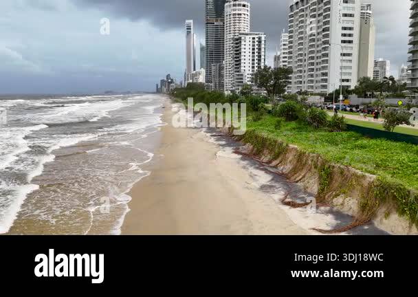 Drone footage captures severe beach erosion and turbulent waves along ...