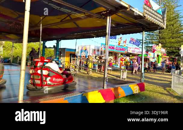 Bumper cars and spinning rides in action Stock Video Footage - Alamy