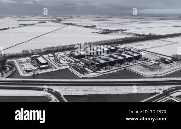 Aerial wide view of a modern data center and logistics buildings ...