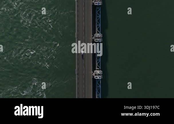 High angle aerial perspective showing a continuous flow of traffic with ...