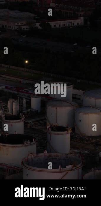 Aerial view showing large storage tanks at an oil refinery during the ...