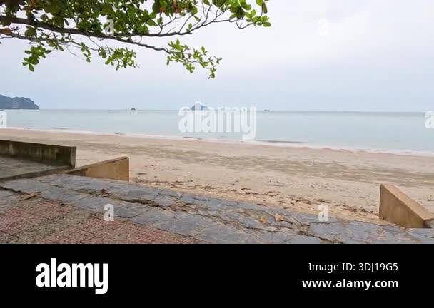 Peaceful beach scene with distant islands Stock Video Footage - Alamy