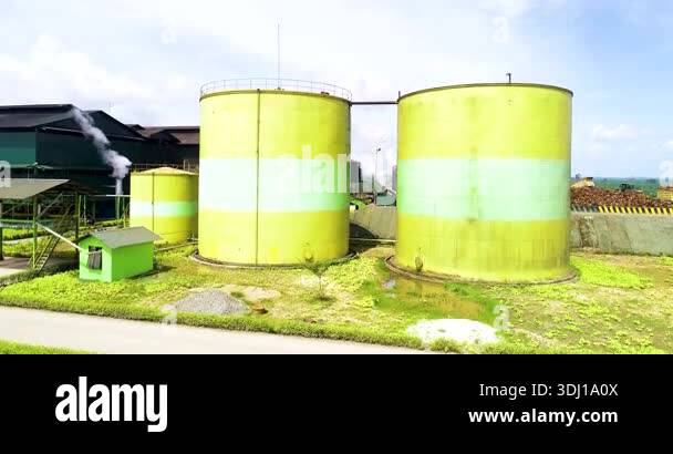 Industrial CPO Storage: Aerial Tilt-Up of Massive Refinery Tanks ...