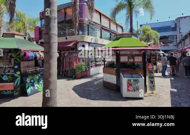 Open commercial architecture with central stalls and decorative ...