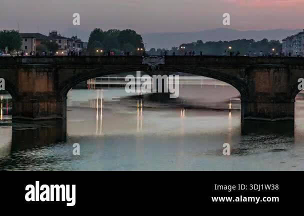 Twilight scene of Ponte Santa Trinita Holy Trinity Bridge day to night ...