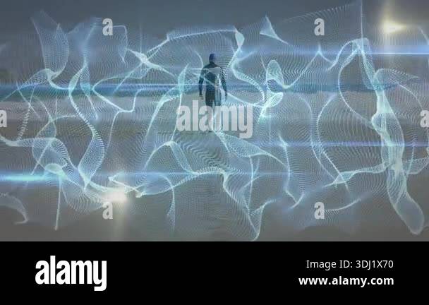 Man appearing on horizon and walking forward through technology ...