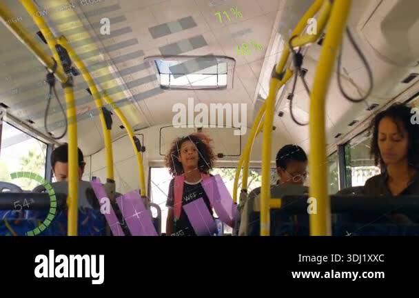Teenage female student approaching transit bus door gripping rail for ...