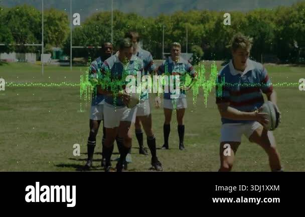 Male rugby players taking off on signal, spin-passing balls along ...