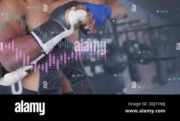 Boxer examining glove interior sliding hand into strap while graphs ...