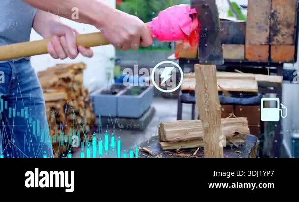 Man lifting pink-wrapped axe over log chopping, splitting wood ...