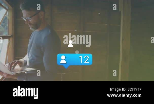 Mature man typing on laptop and starting marketing engagement count ...