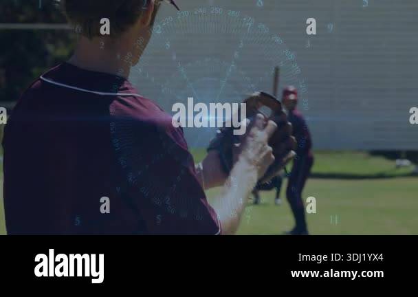 Pitcher initiating wind-up in sports practice, driving baseball toward ...