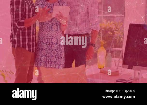 Business team approaching tablet and initiating project overview for ...