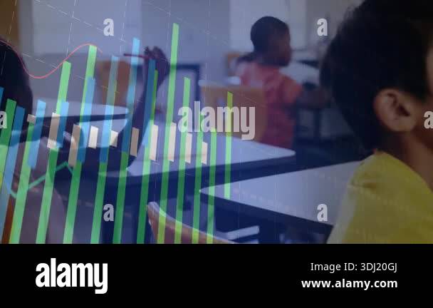 Responding to off-screen prompt, Asian boy raising pencil with charts ...