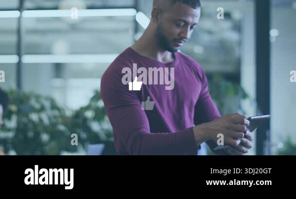 Office worker tapping tablet and seeing animated thumbs-up icons ...