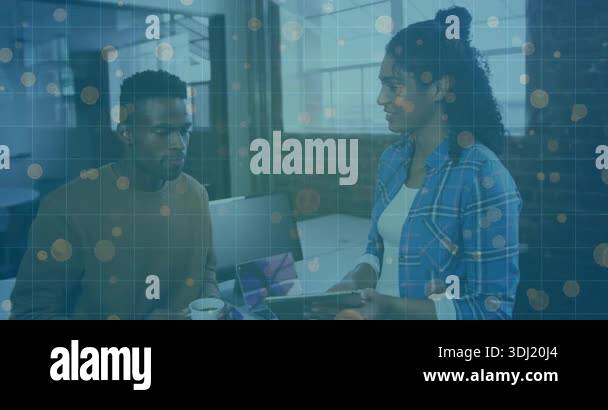 Man tapping desk and activating icons on tablet in business review ...