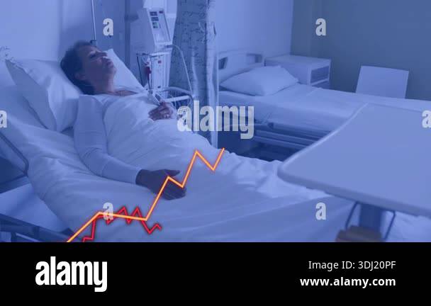 Patient woman reclining bed near monitor starting animated graphs ...